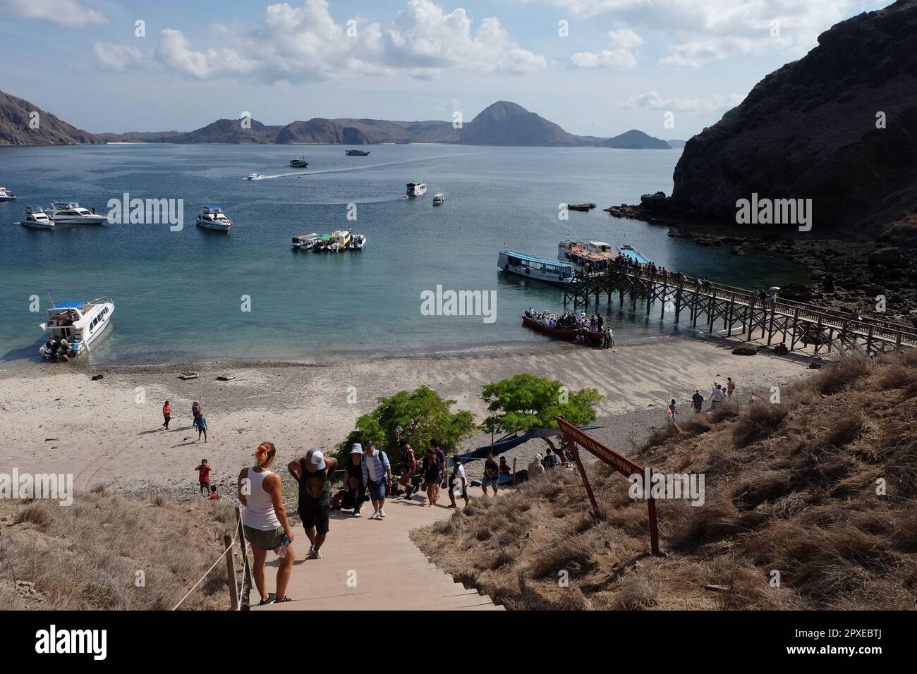PADAR ISLAND, LABUAN BAJO, INDONESIA - NOVEMBER 2019: Tourists visit ...