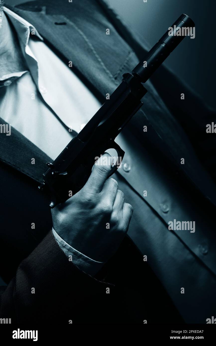 Well dressed male secret agent detective spy wearing suit and tie ...