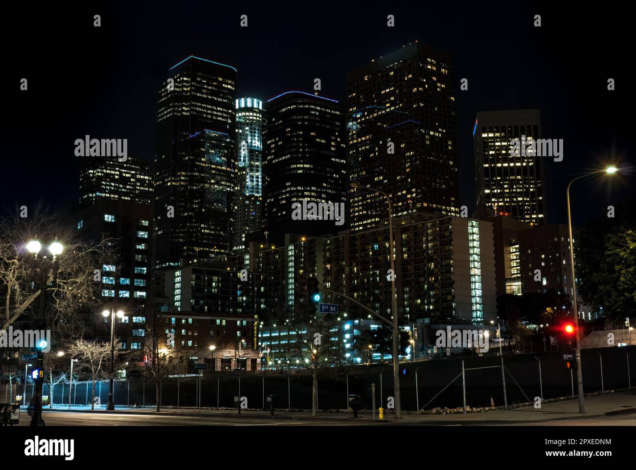 An illuminated night scene of the downtown Los Angeles skyline with ...