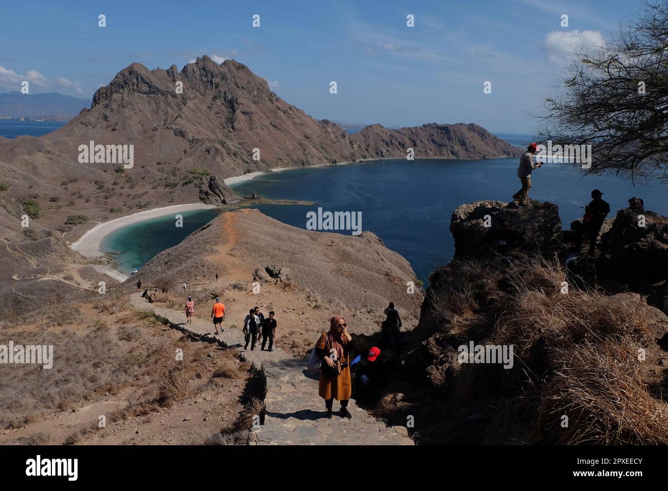 PADAR ISLAND, LABUAN BAJO, INDONESIA - NOVEMBER 2019: Tourists visit ...