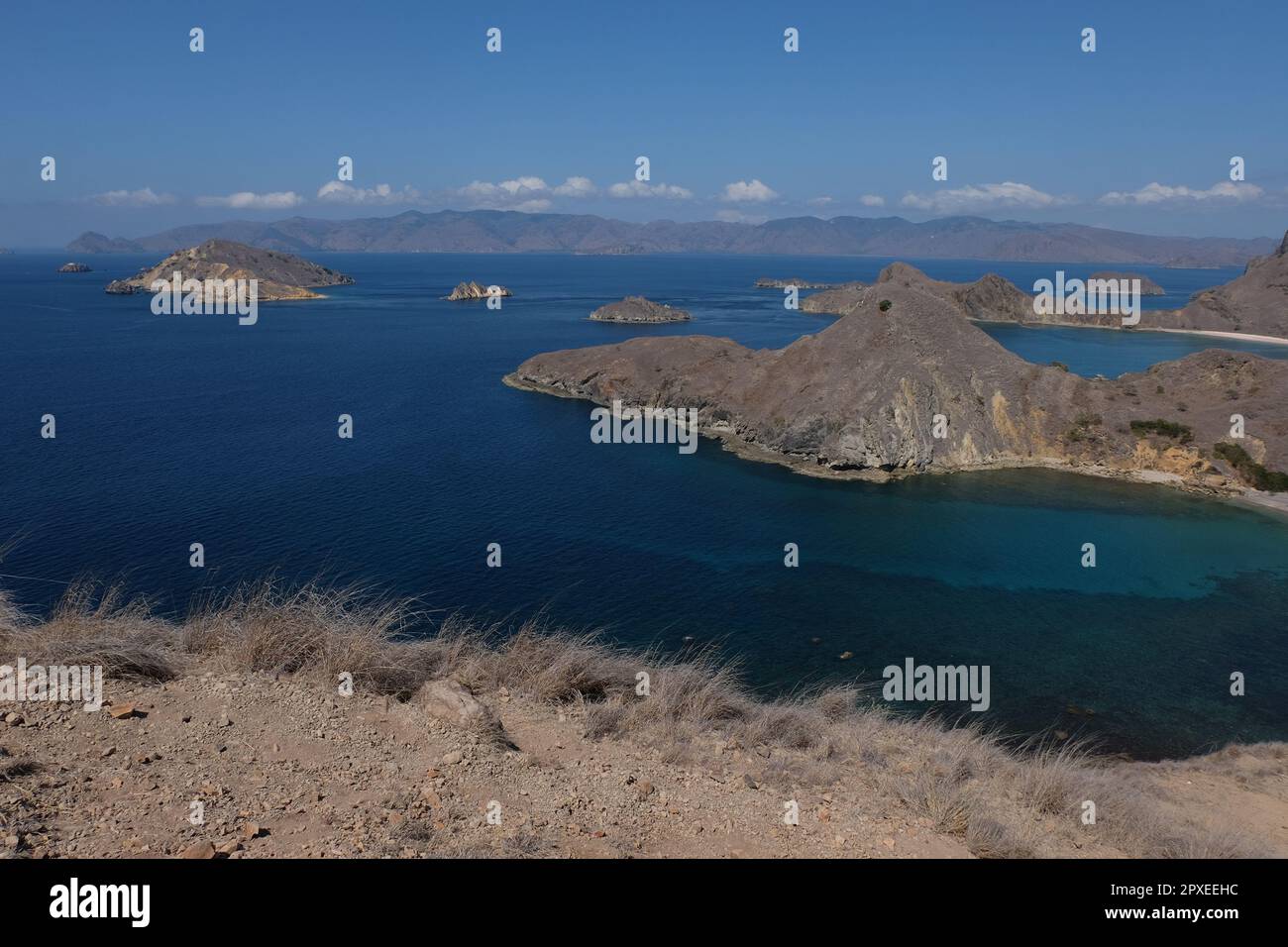 Tourists visiting Padar Island in Labuan Bajo during the dry season, a ...