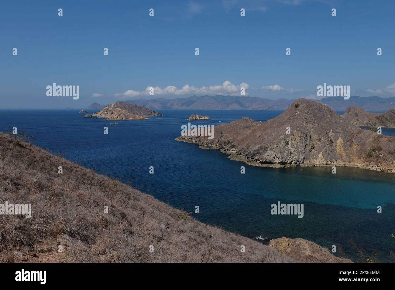 Tourists visiting Padar Island in Labuan Bajo during the dry season, a ...