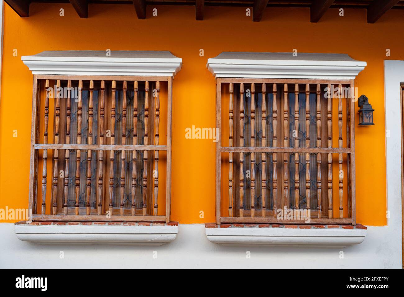 photo of two window exterior. house with window outdoor. building with ...