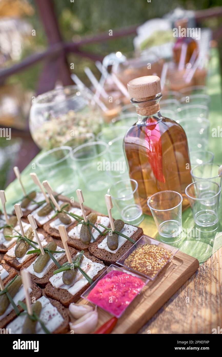 Sandwiches with lard and pickles. Classic ukrainian alcohol tincture ...