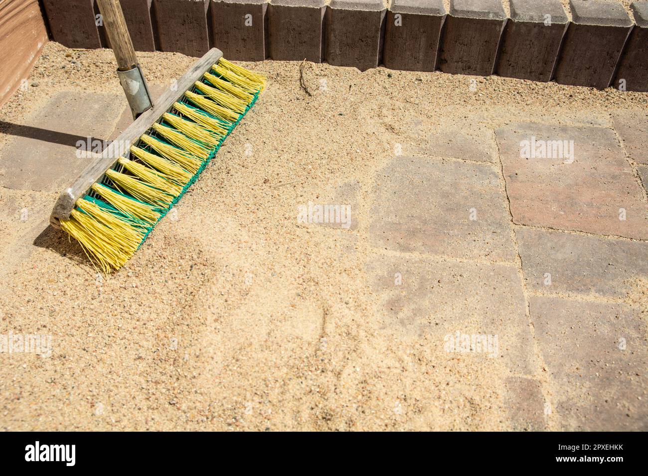 Sweeping up sand hi-res stock photography and images - Alamy