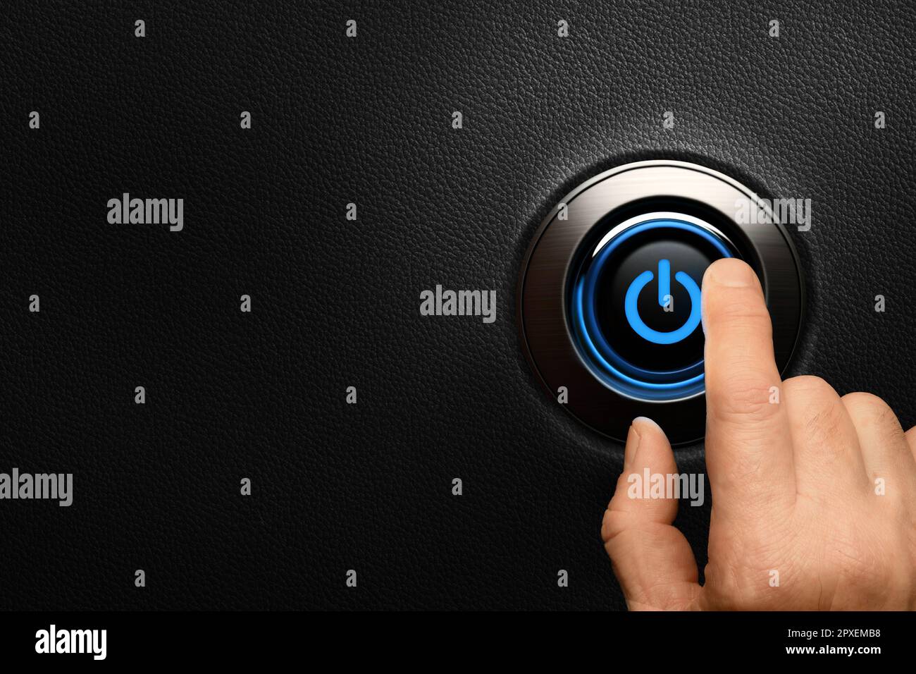 Finger about to press a power button on car dashboard Stock Photo - Alamy