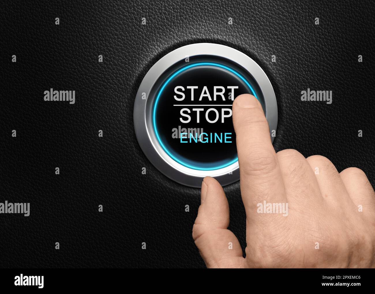Finger about to press Engine start button with blue glowing ring in a ...