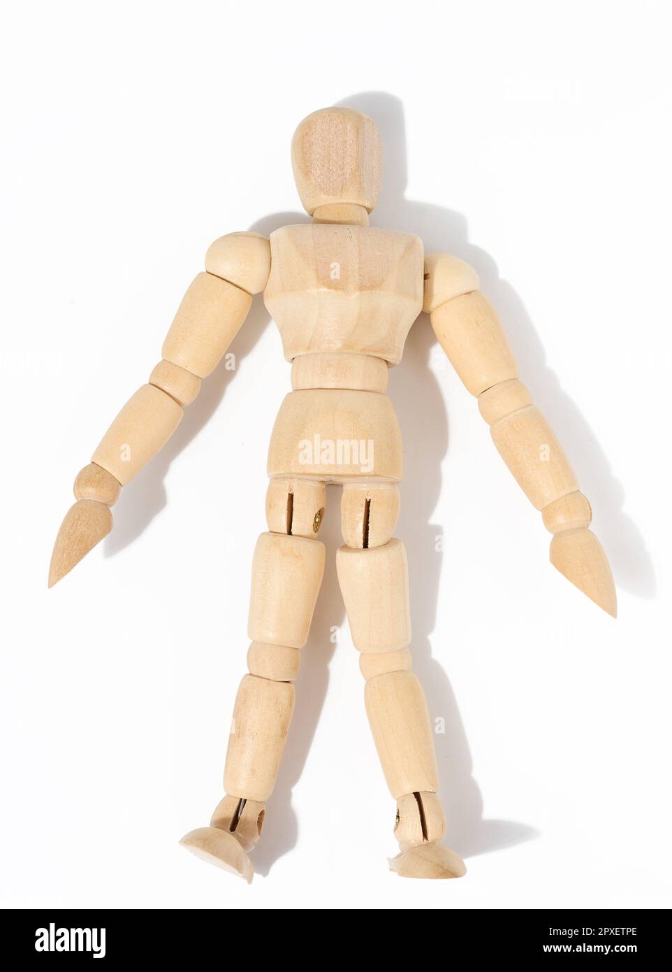 Wooden toy mannequin, marionette on a white background Stock Photo - Alamy