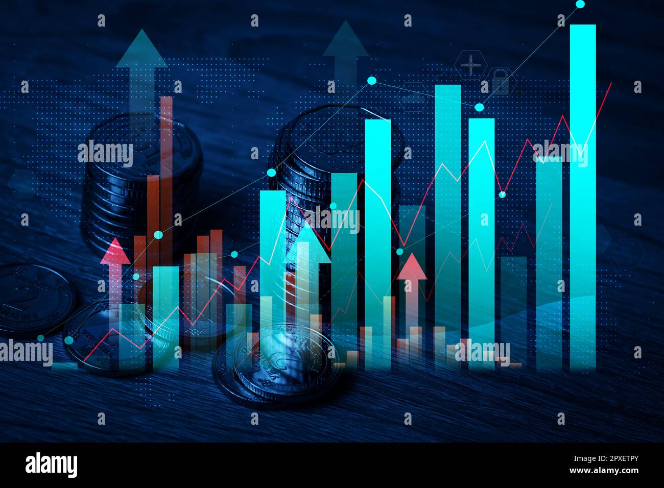 A stack of metallic coins and a chart with growing rates. High income ...