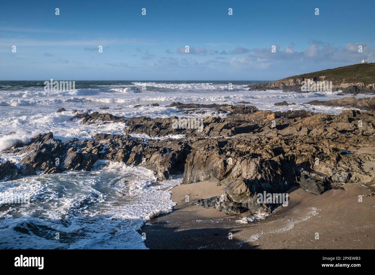 Incoming tide at the rocky rugged Little Fistral on the coast of ...