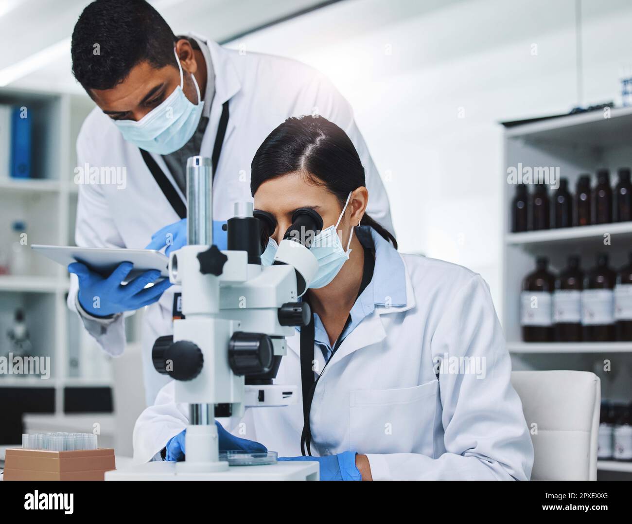 Building a better tomorrow through research. two young researchers ...