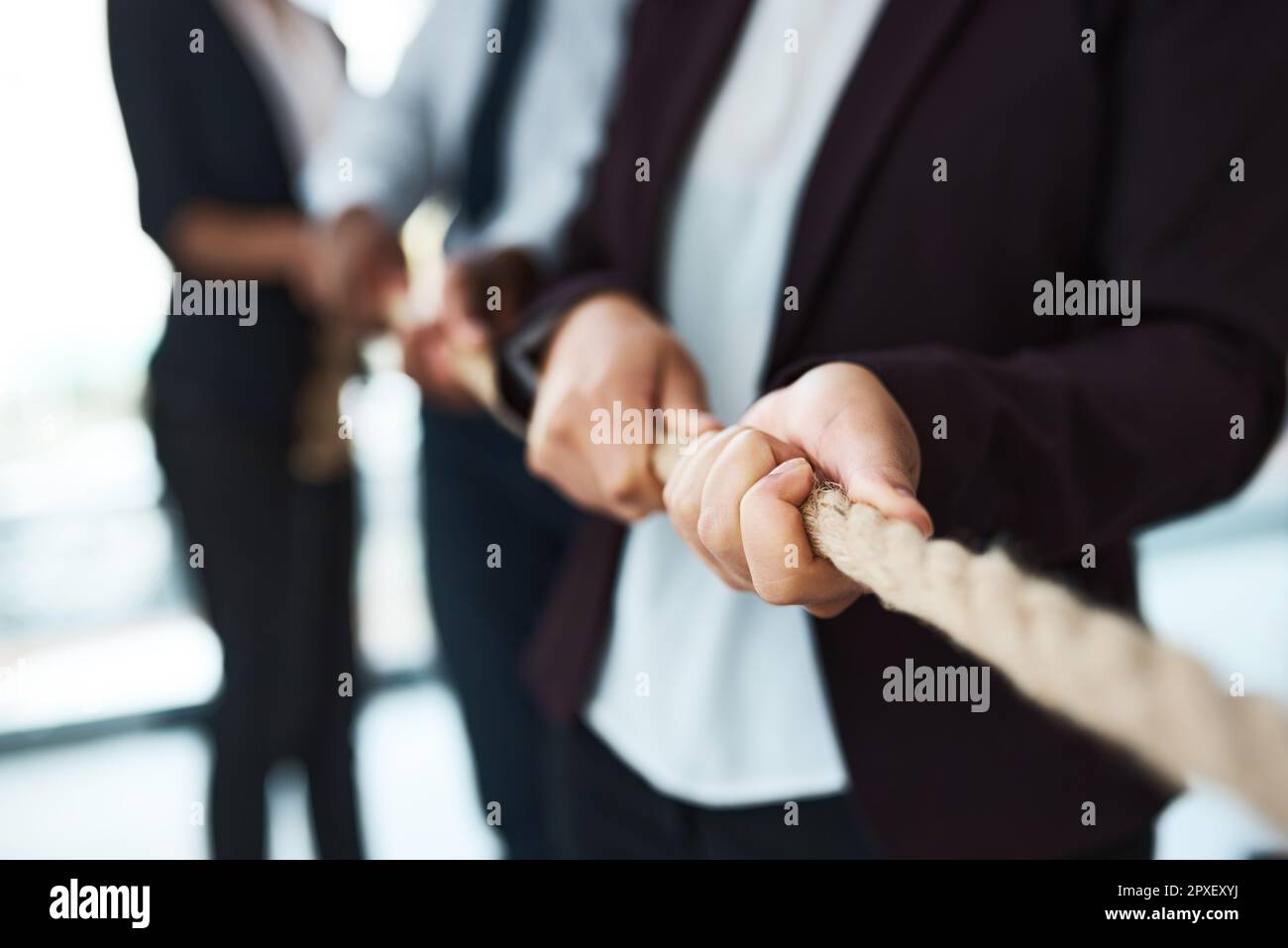 Team building. unrecognizable businesspeople pulling on a rope Stock ...