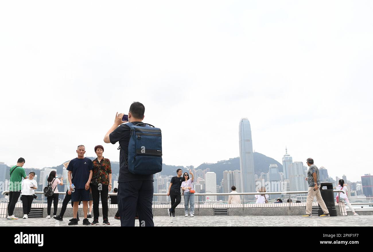 Hong Kong, China. 30th Apr, 2023. Tourists visit Tsim Sha Tsui in Hong ...