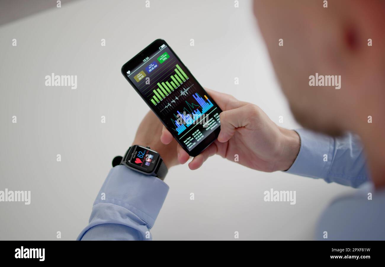 Hand With Smart Watch And Mobile Phone Showing Heart Beat Rate Stock ...