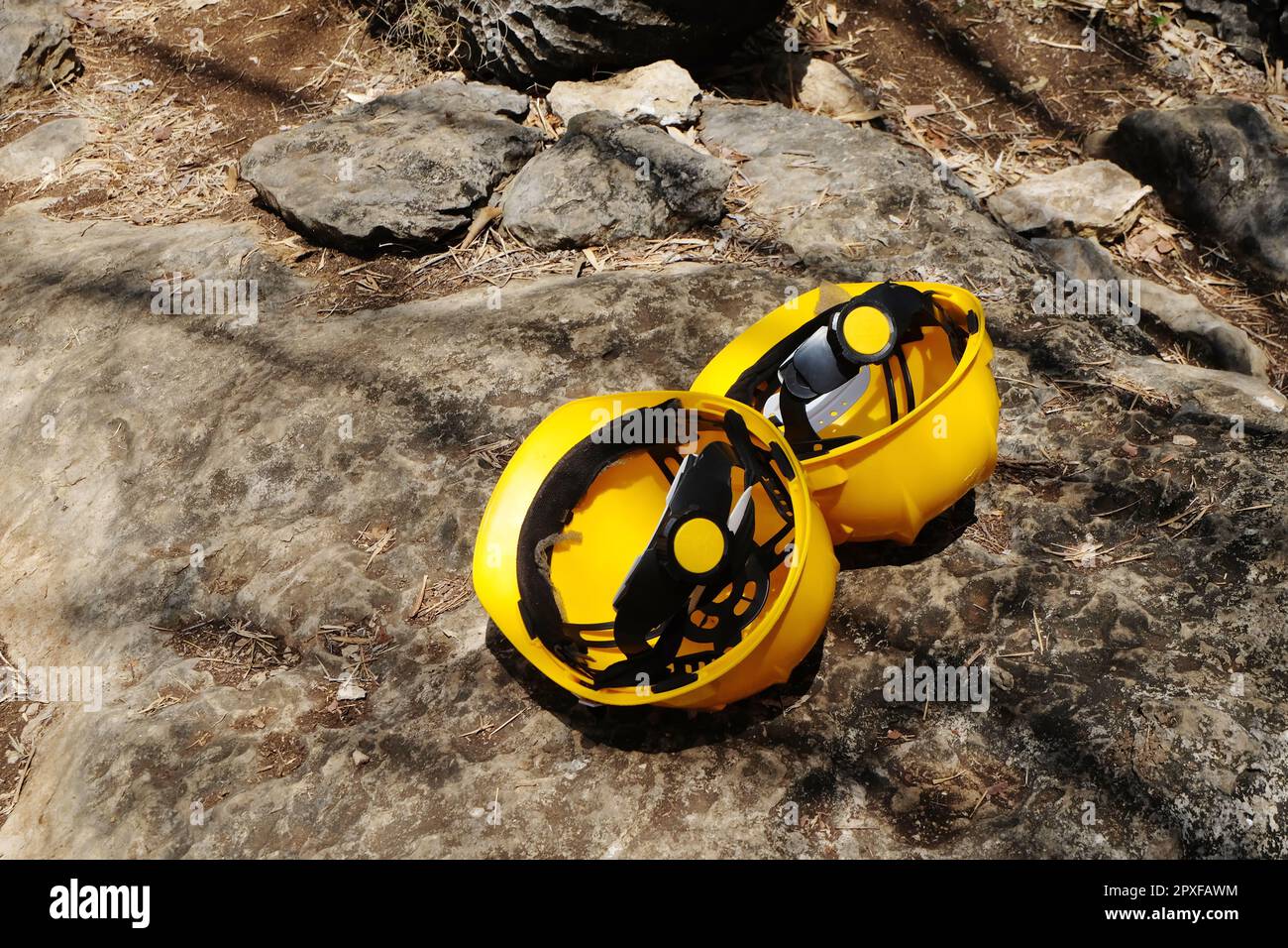 The helmet is on the rocks of the cave Stock Photo - Alamy