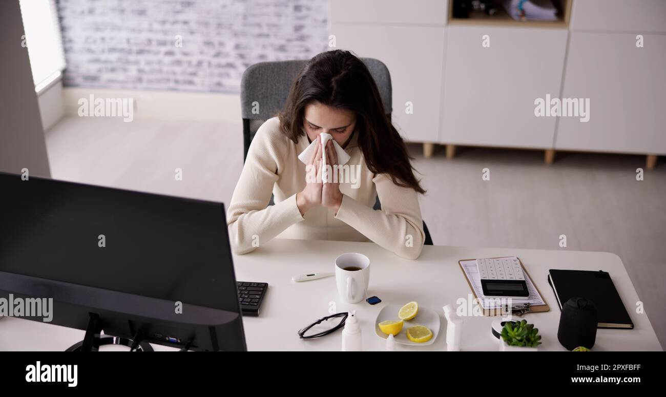 Sick Office Employee Sneezing At Work. Business Executive Stock Photo ...