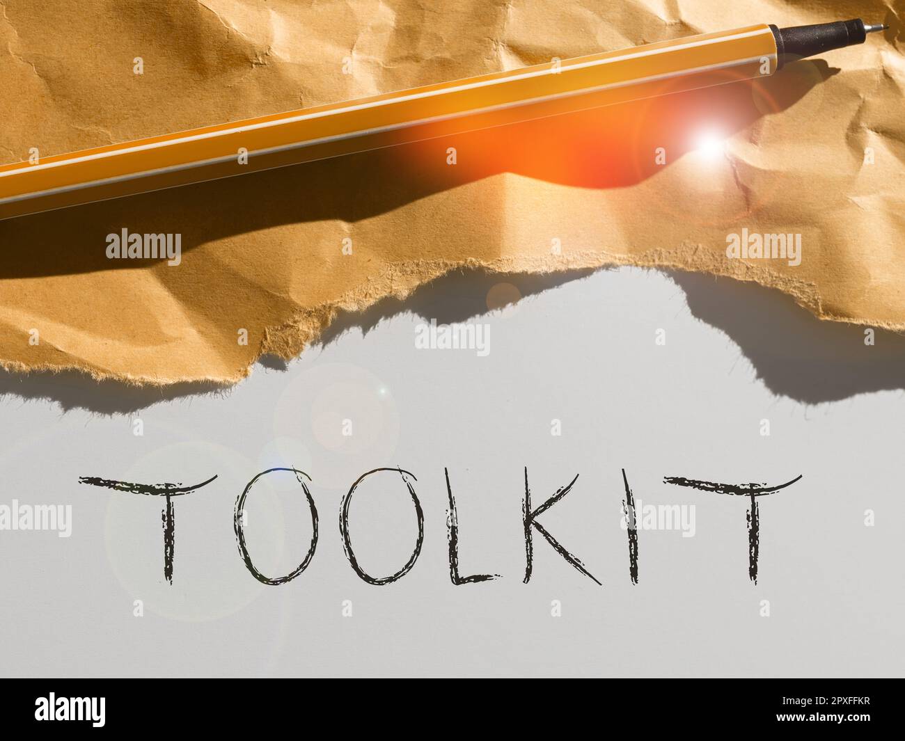 Hand writing sign Toolkit, Business showcase set of tools kept in a bag ...