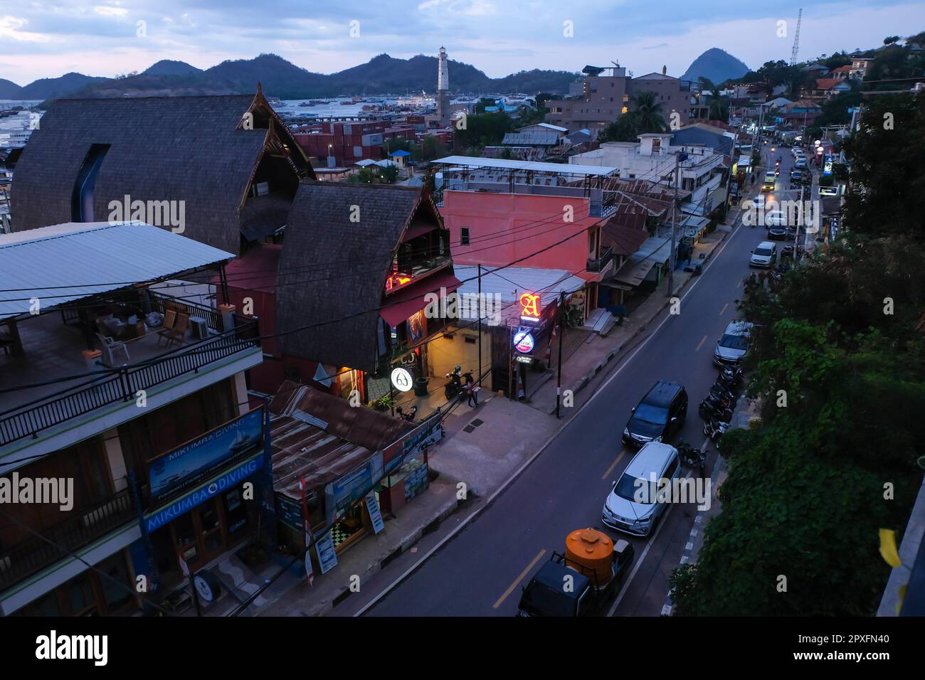 Sunset atmosphere around the Waters and Port of Labuan Bajo, one of the ...