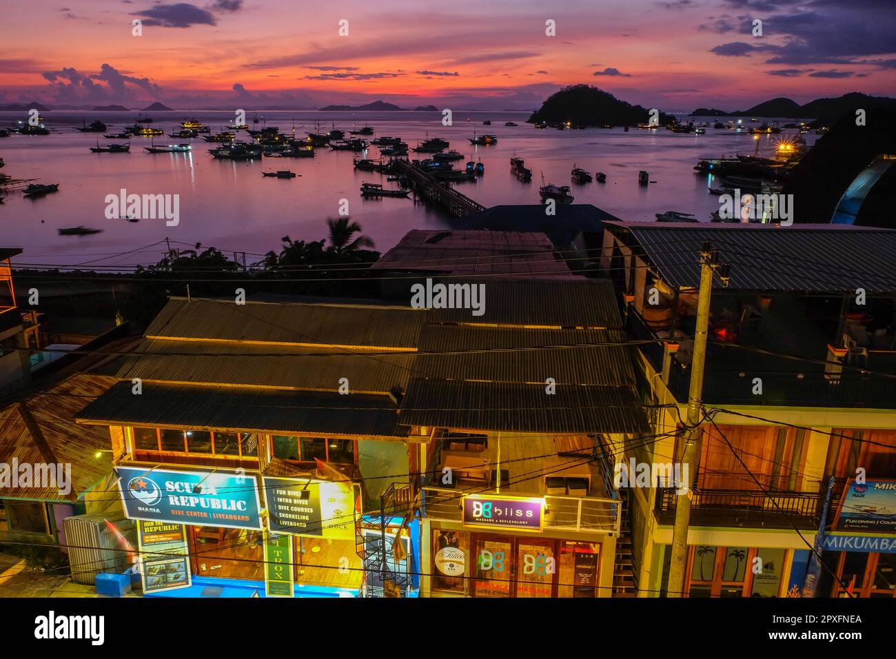Sunset atmosphere around the Waters and Port of Labuan Bajo, one of the ...