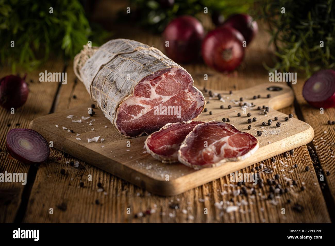 Dry cured pork loin, still life of gourmet dish Stock Photo - Alamy