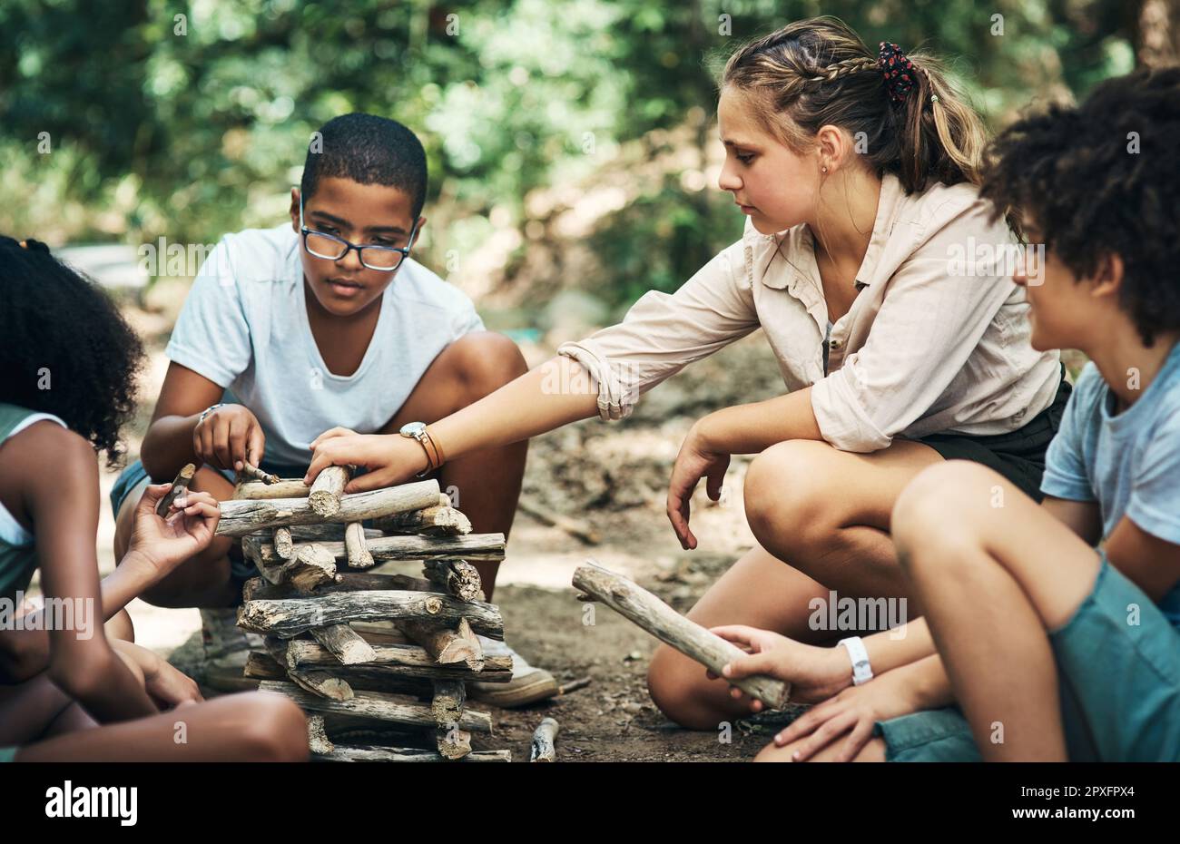 Building friendships and learning new skills. a group of teenagers ...