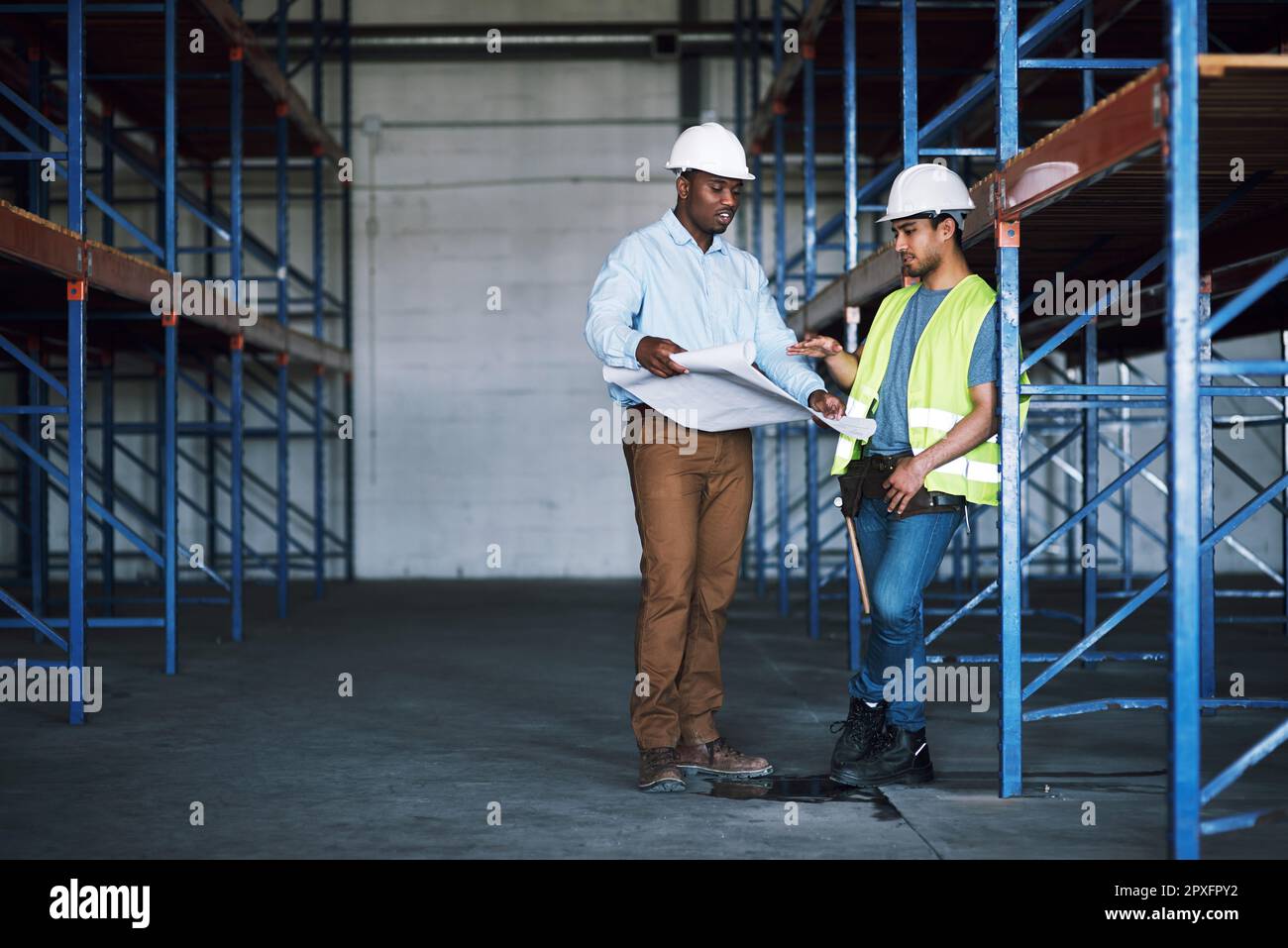 The smallest team that gets the biggest results. two builders having a ...