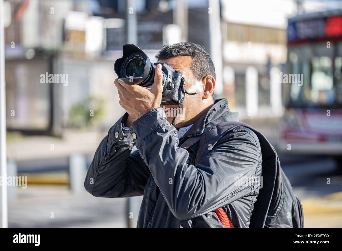 Close-up of a photographer taking a picture Stock Photo - Alamy