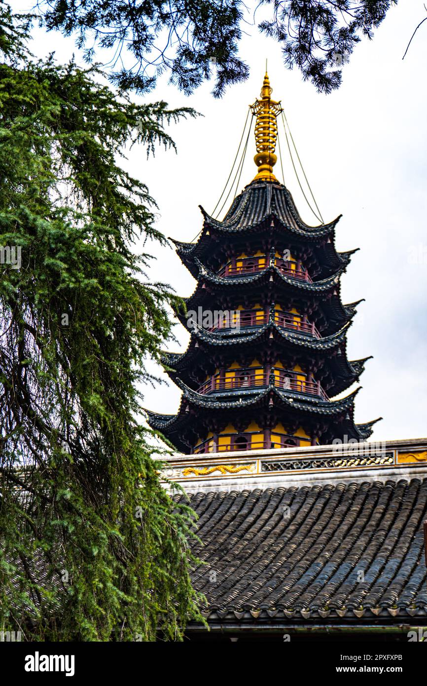 A stunning image of a traditional Chinese temple surrounded by lush ...