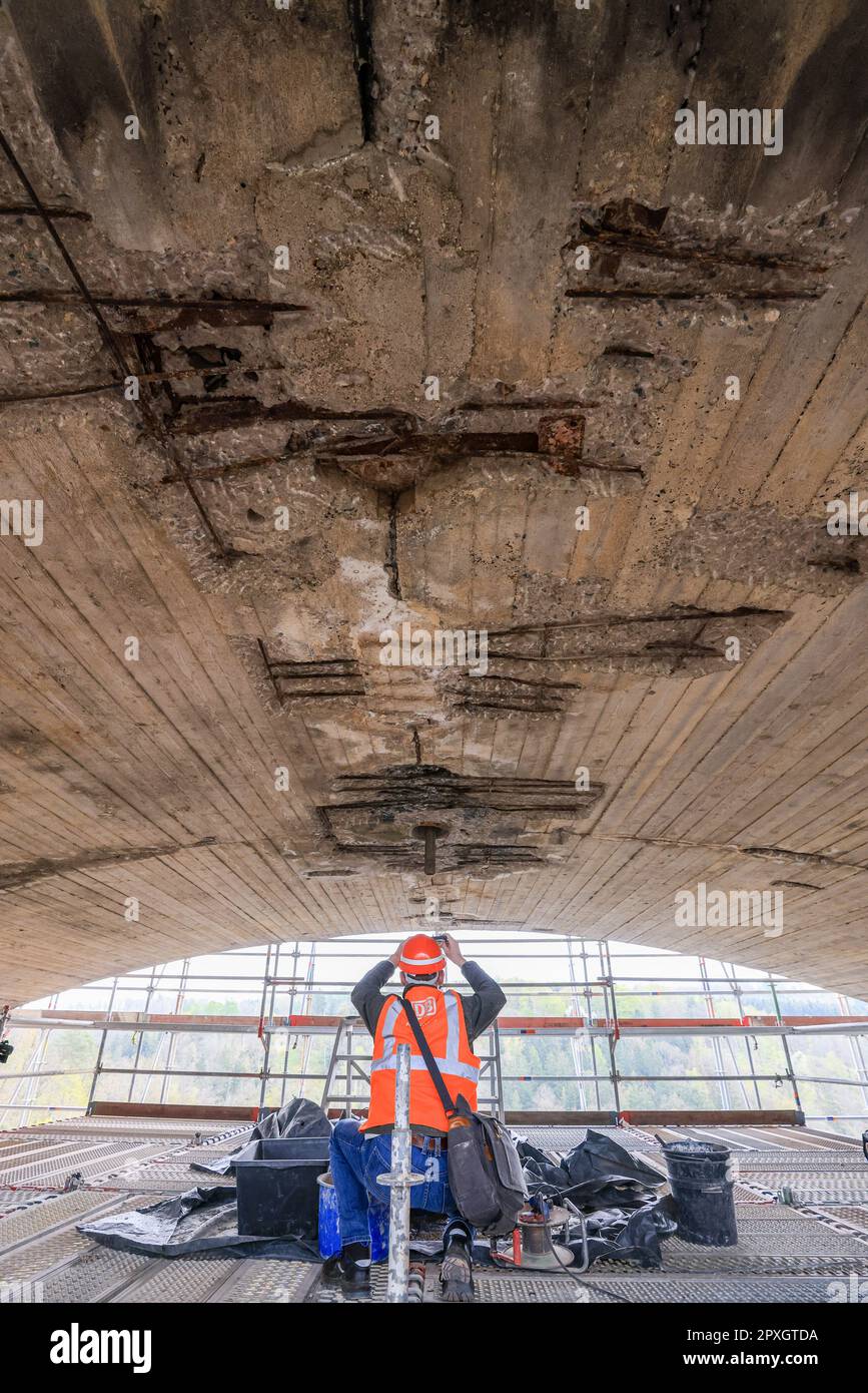 02 May 2023, Saxony, Jocketa: A journalist takes a photo of the damage ...