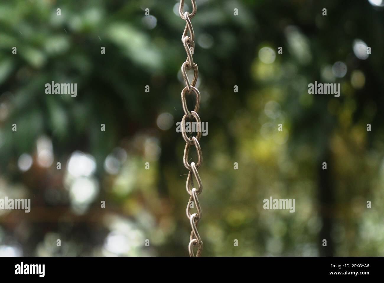 Hanging metal chain hi-res stock photography and images - Alamy