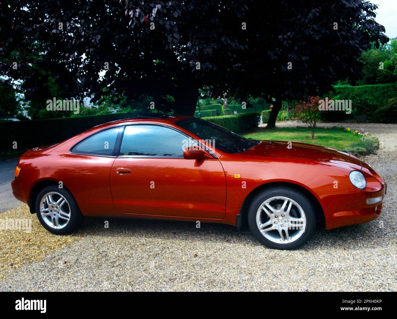 Toyota Celica Red Sports Car Parked in Drive Stock Photo - Alamy