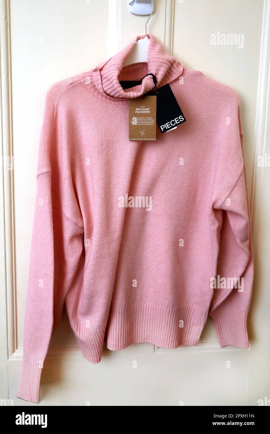 Recycled Polyester Pink Turtle Neck Jumper with Labels Stock Photo - Alamy