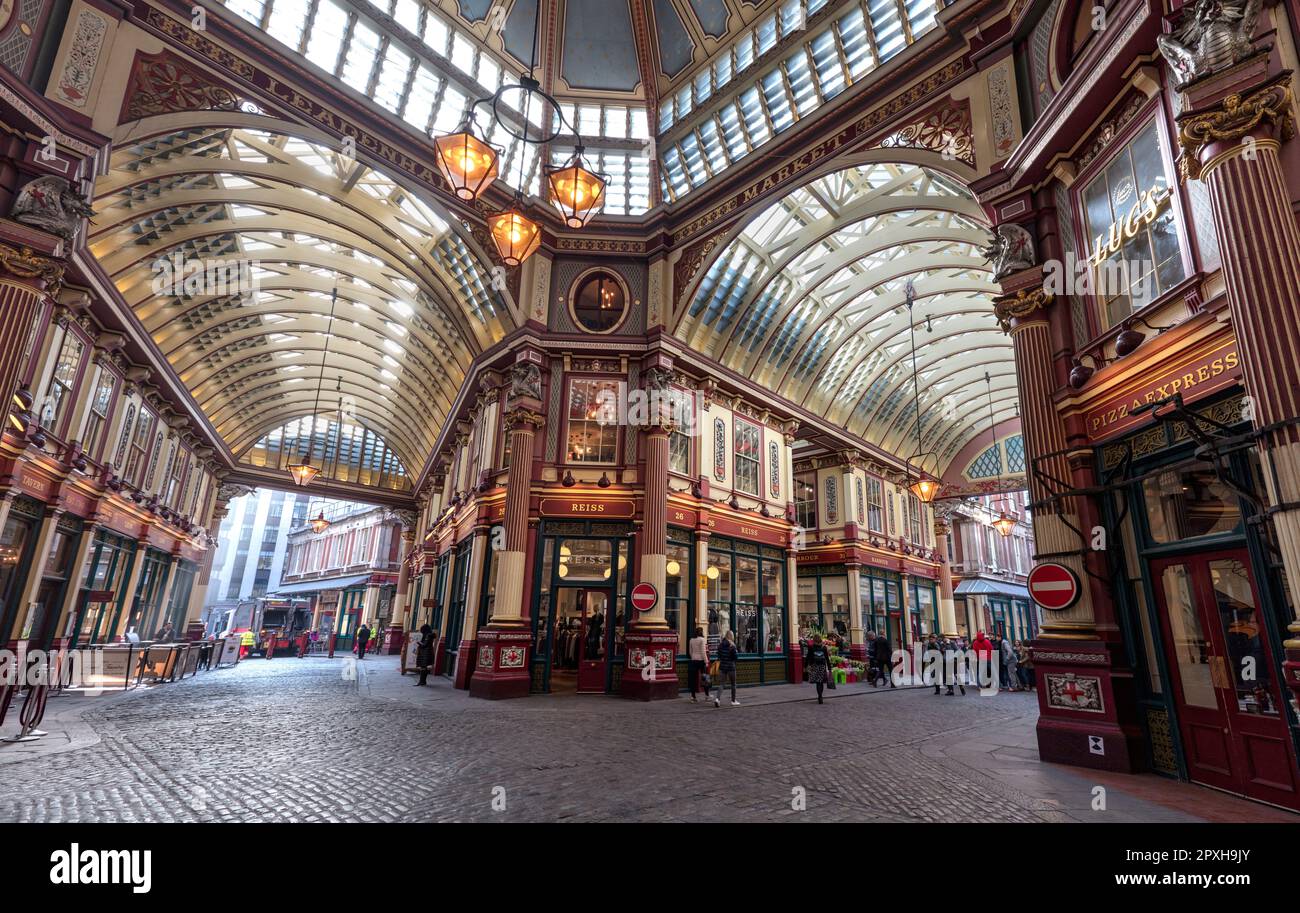 Shops, cafes, restaurants in 14th century Leadenhall market with ornate ...