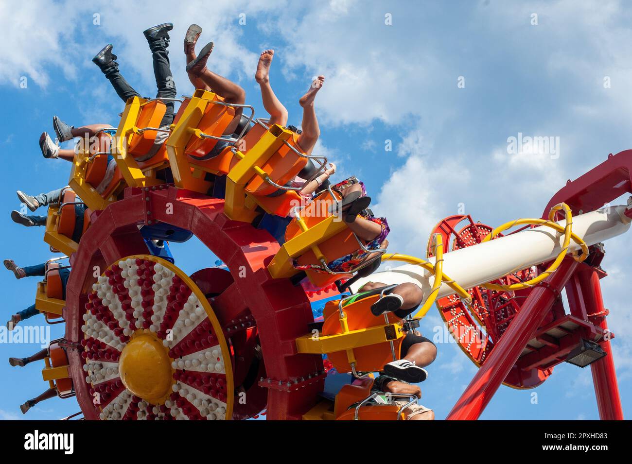 A thrilling rollercoaster ride with multiple passengers in and out of ...