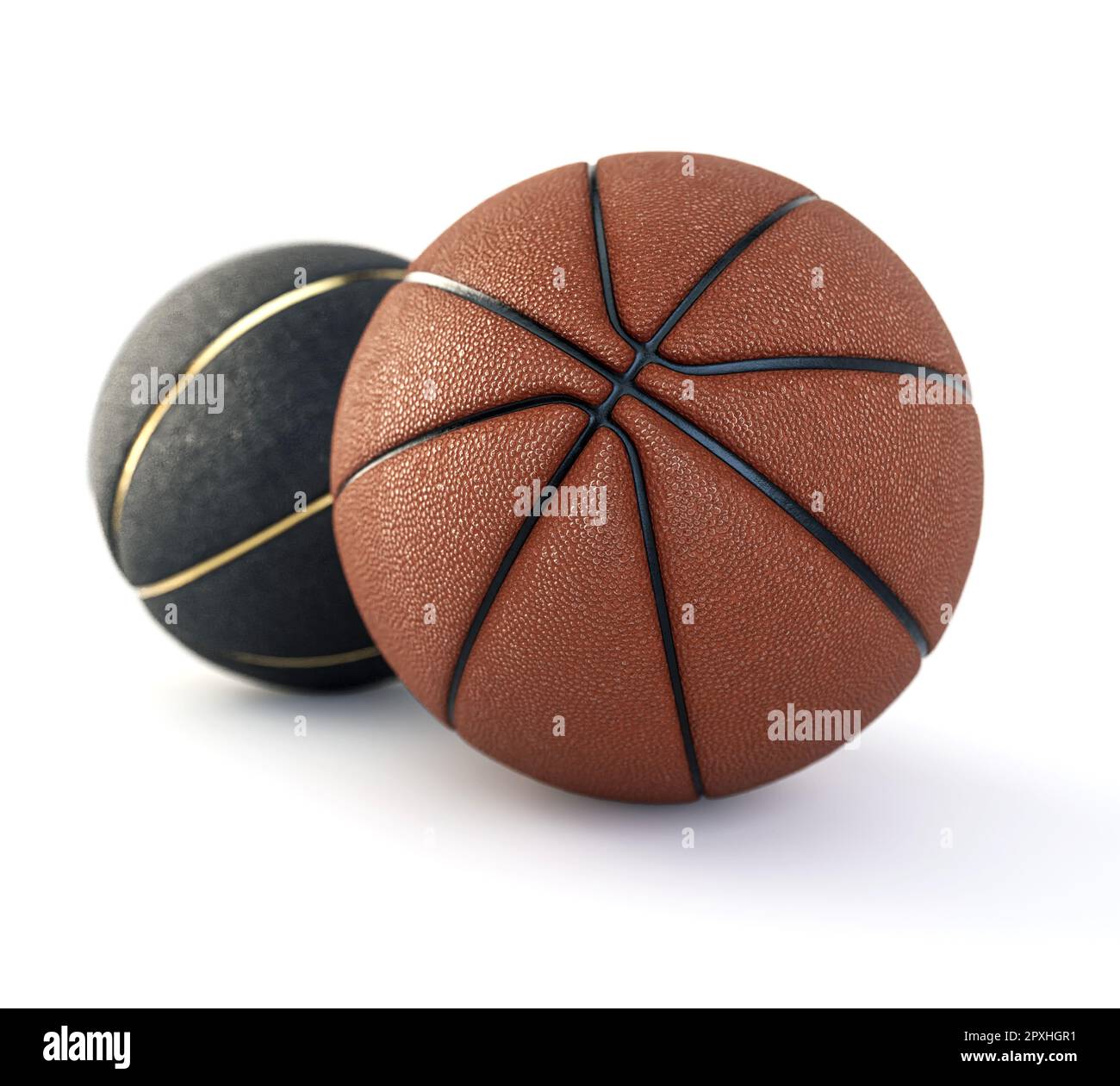 A pair of regulation orange and black rubber basketballs on an isolated ...