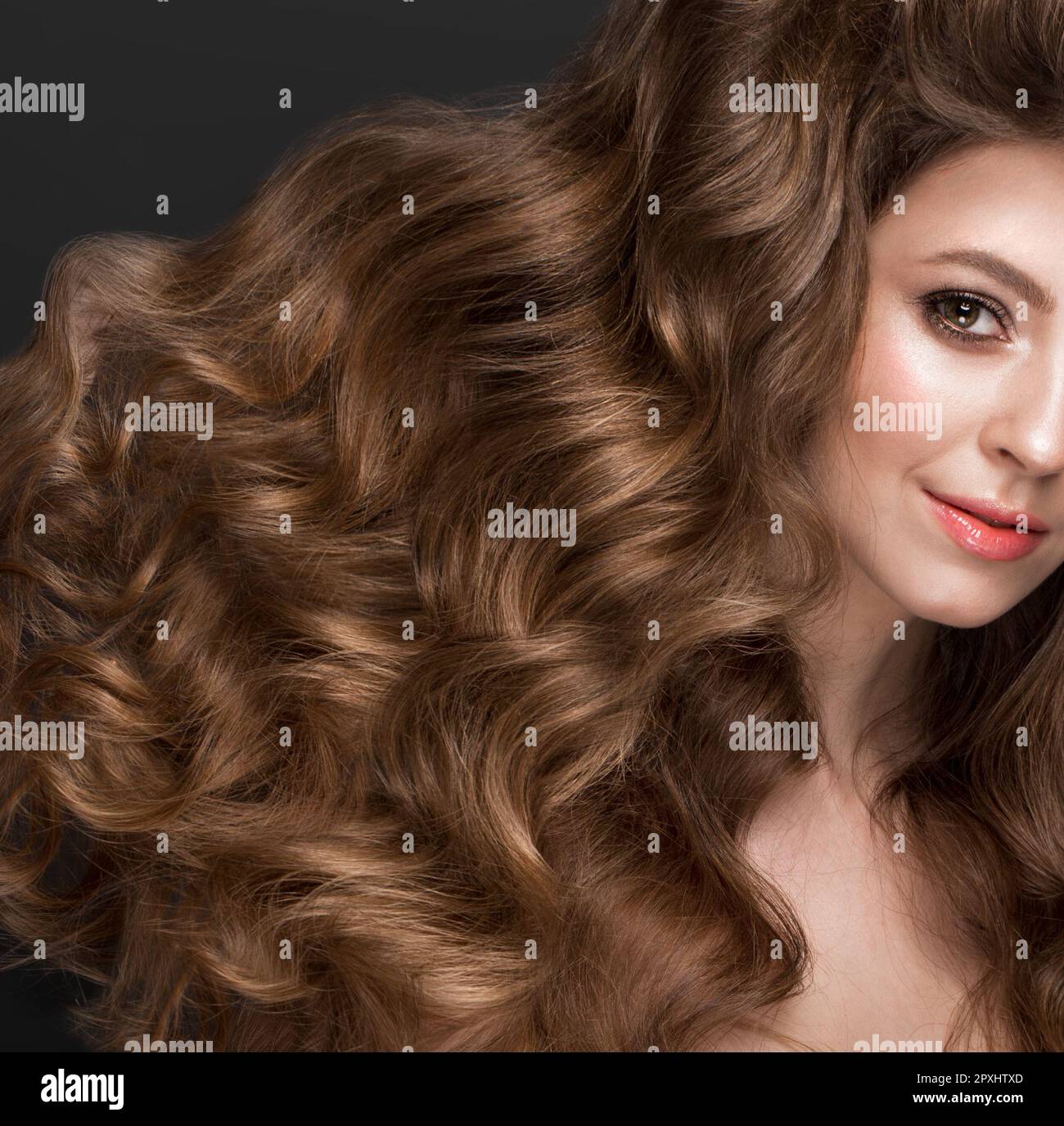 Beautiful brown-haired girl with a perfectly curls hair, and classic ...