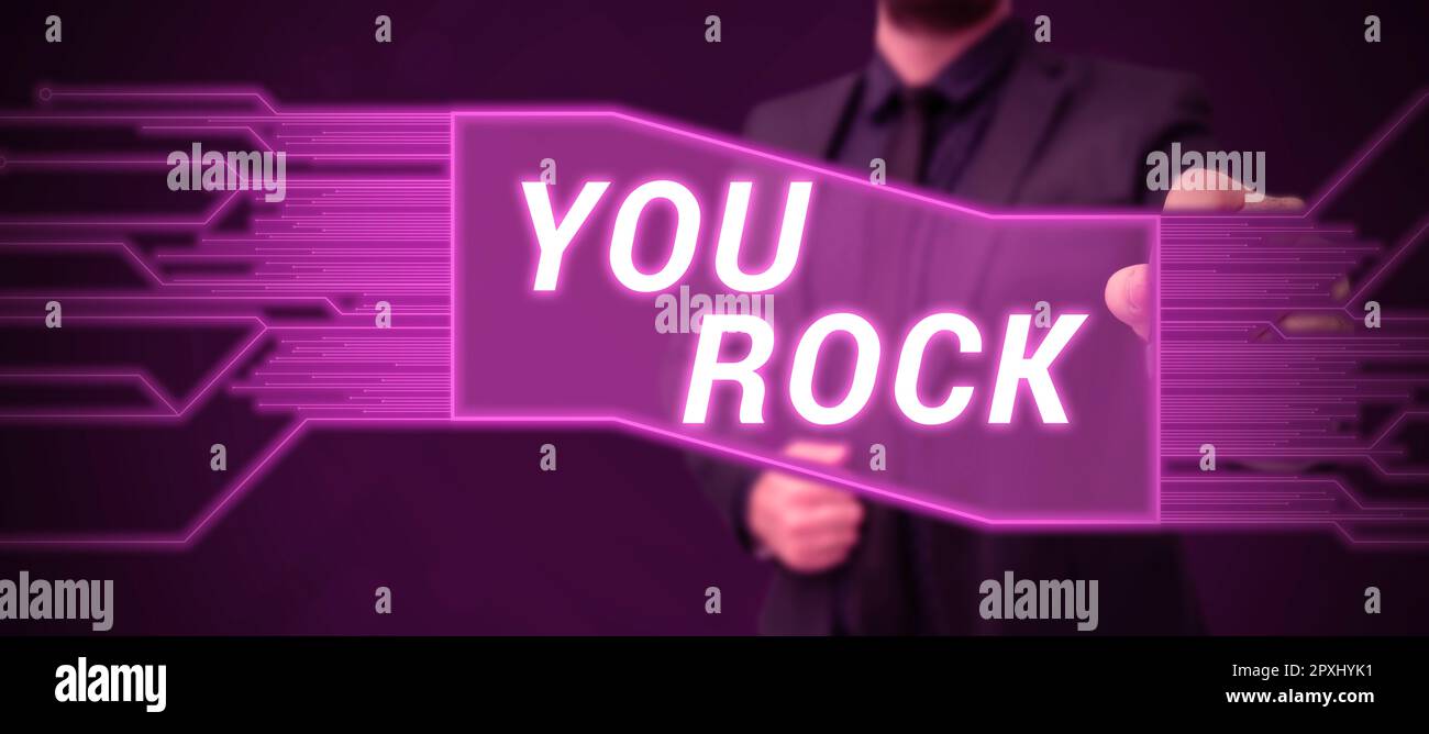 Hand writing sign You Rock, Business idea slang phrase of praise or ...