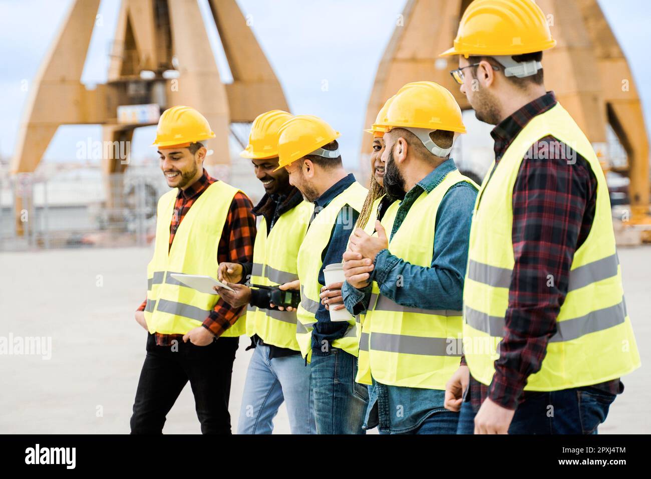 Group of engineer people working at cargo terminal at maritime port ...