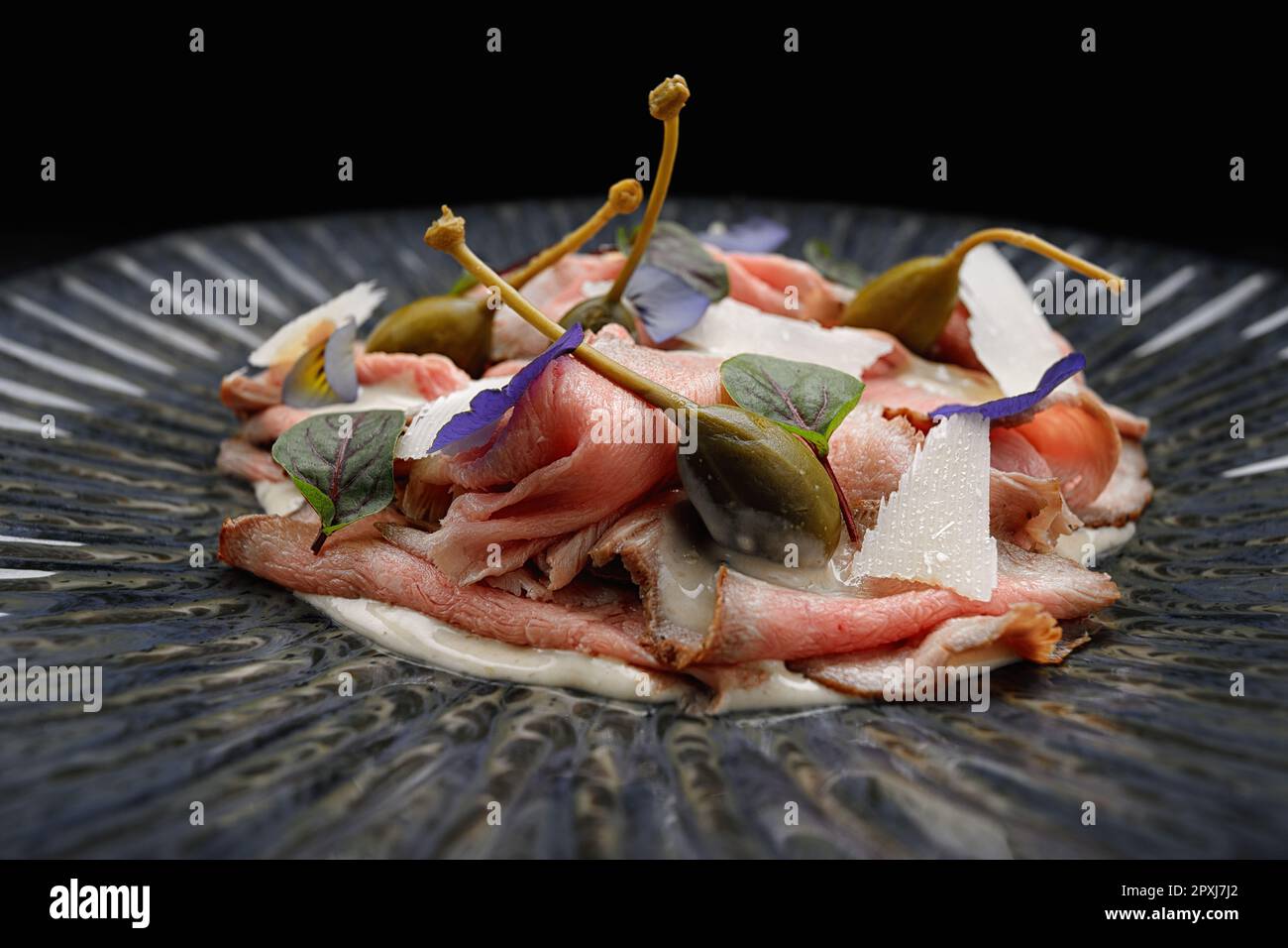 italian cold dish: vitello tonnato with cheese, capers, and sauce Stock ...