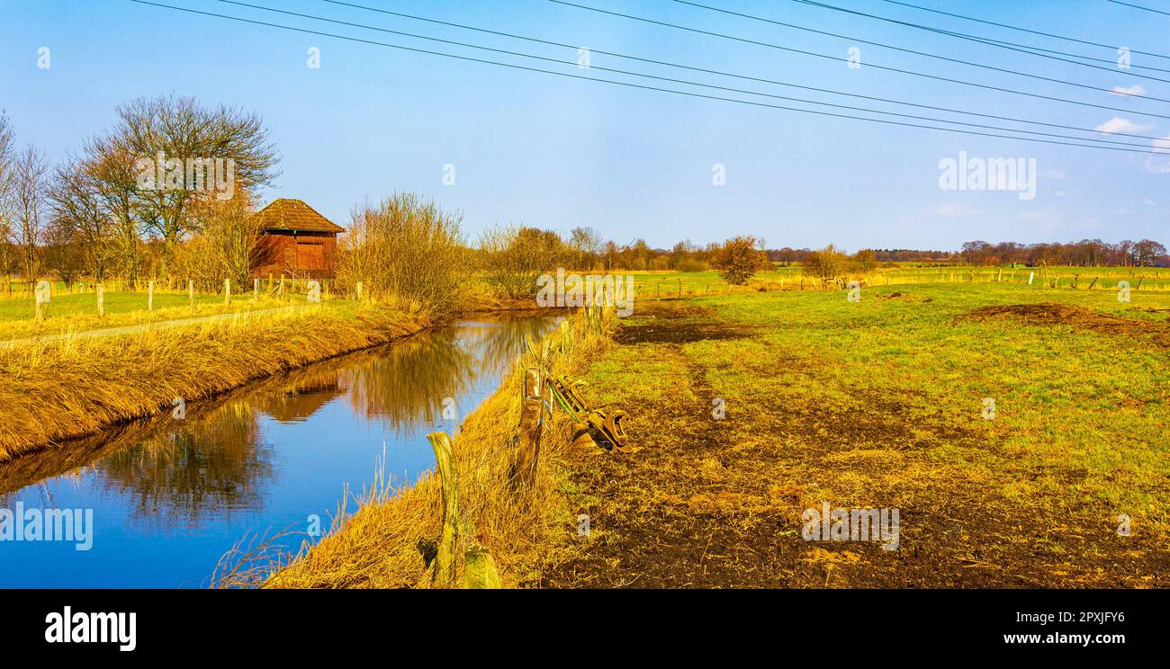 Lake river and water on sunny day in natural landscape in Loxstedt ...