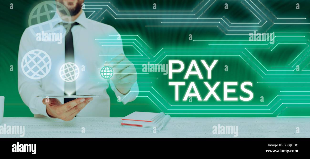 Hand writing sign Pay Taxes, Concept meaning processing taxation and ...