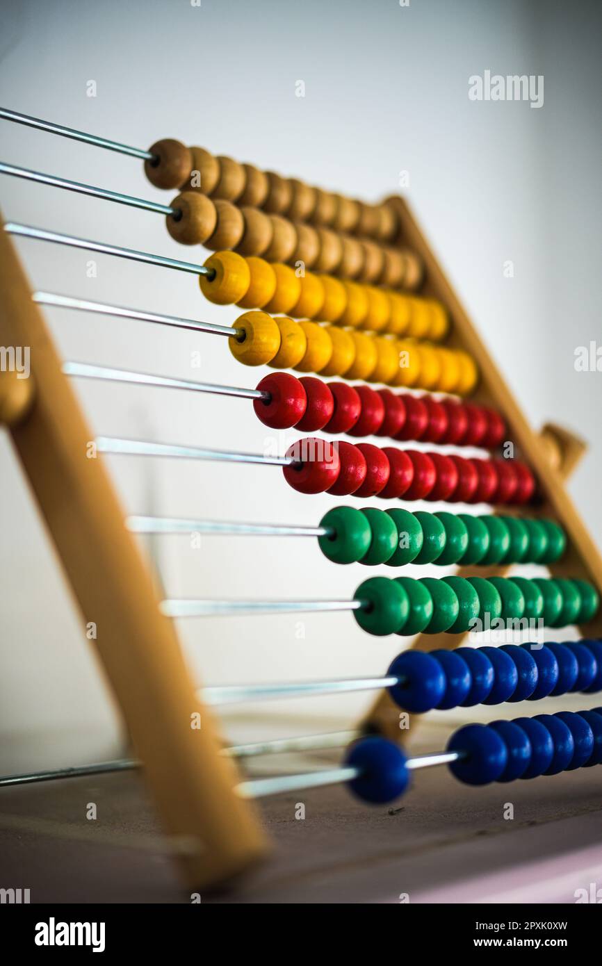 Colorful wooden rainbow abacus hi-res stock photography and images - Alamy