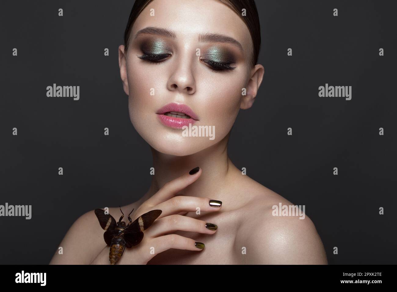 Portrait of beautiful girl with colorful make-up and cicada. Beauty ...