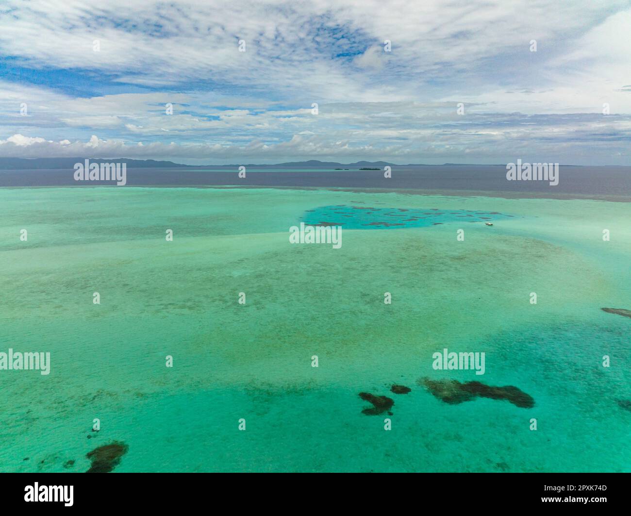 Top view of lagoon surface on atoll and coral reef, copy space for text ...