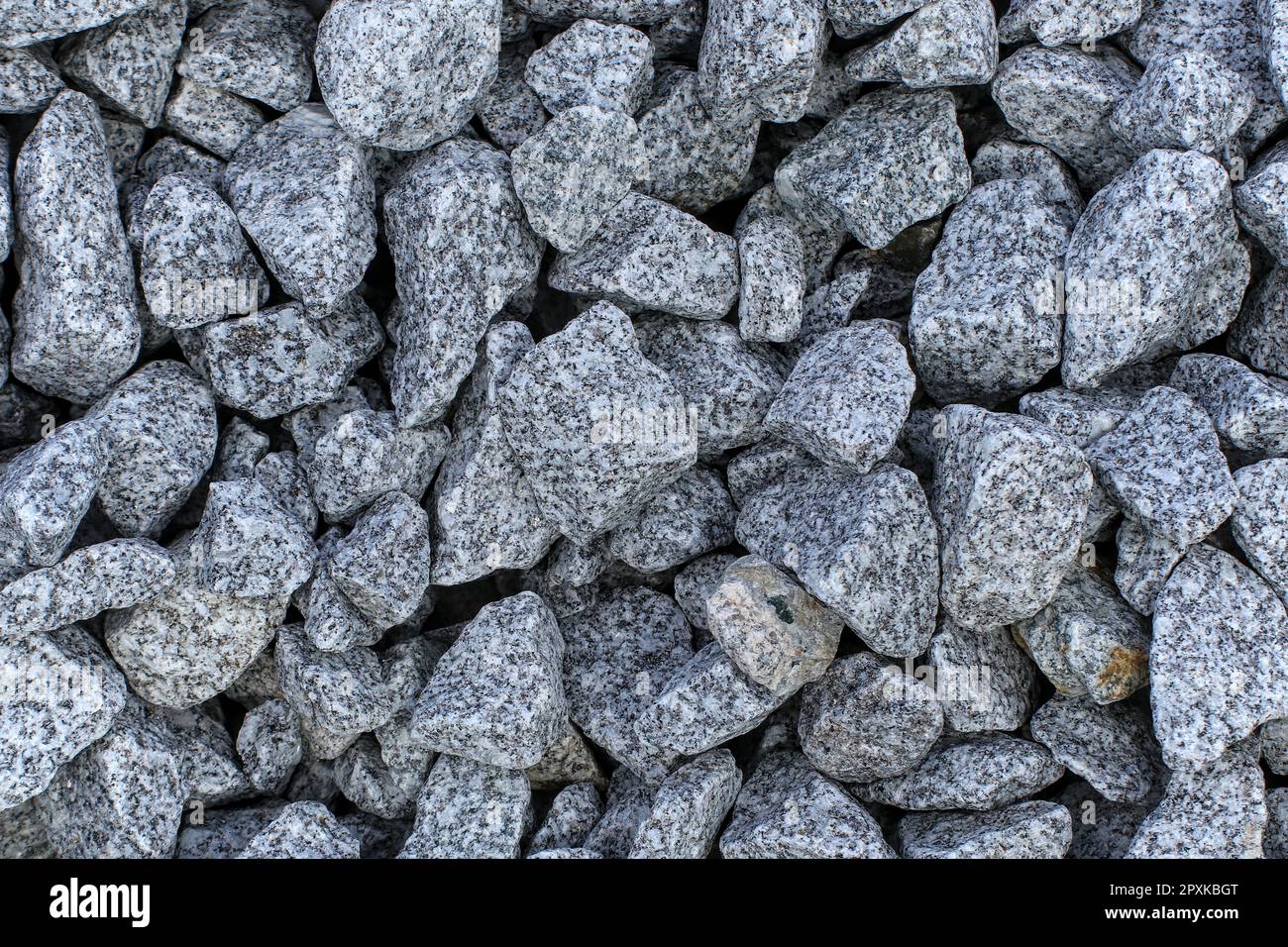 Close-up of small gray and white rocks. Overlapping becomes the ...