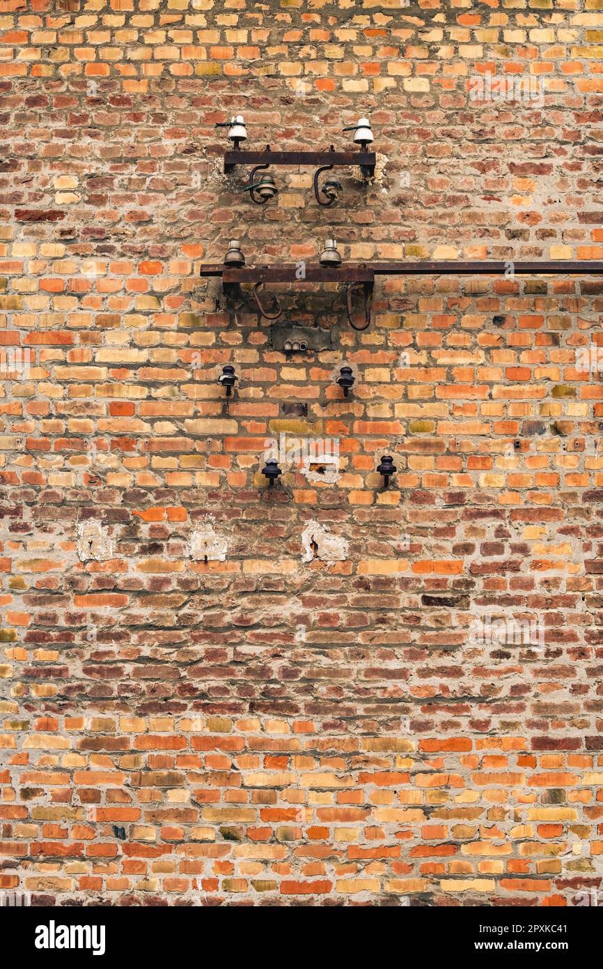 Old electrical fuses on brick wall structure as background Stock Photo ...