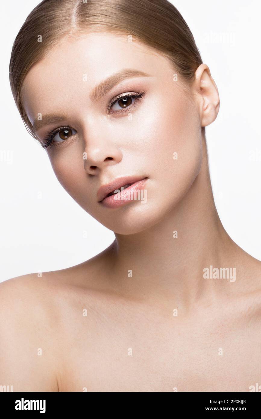 Beautiful young girl with a light natural make-up. Beauty face. Picture ...