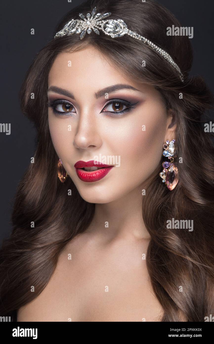 Beautiful woman with arabic make-up, red lips and curls. Beauty face ...