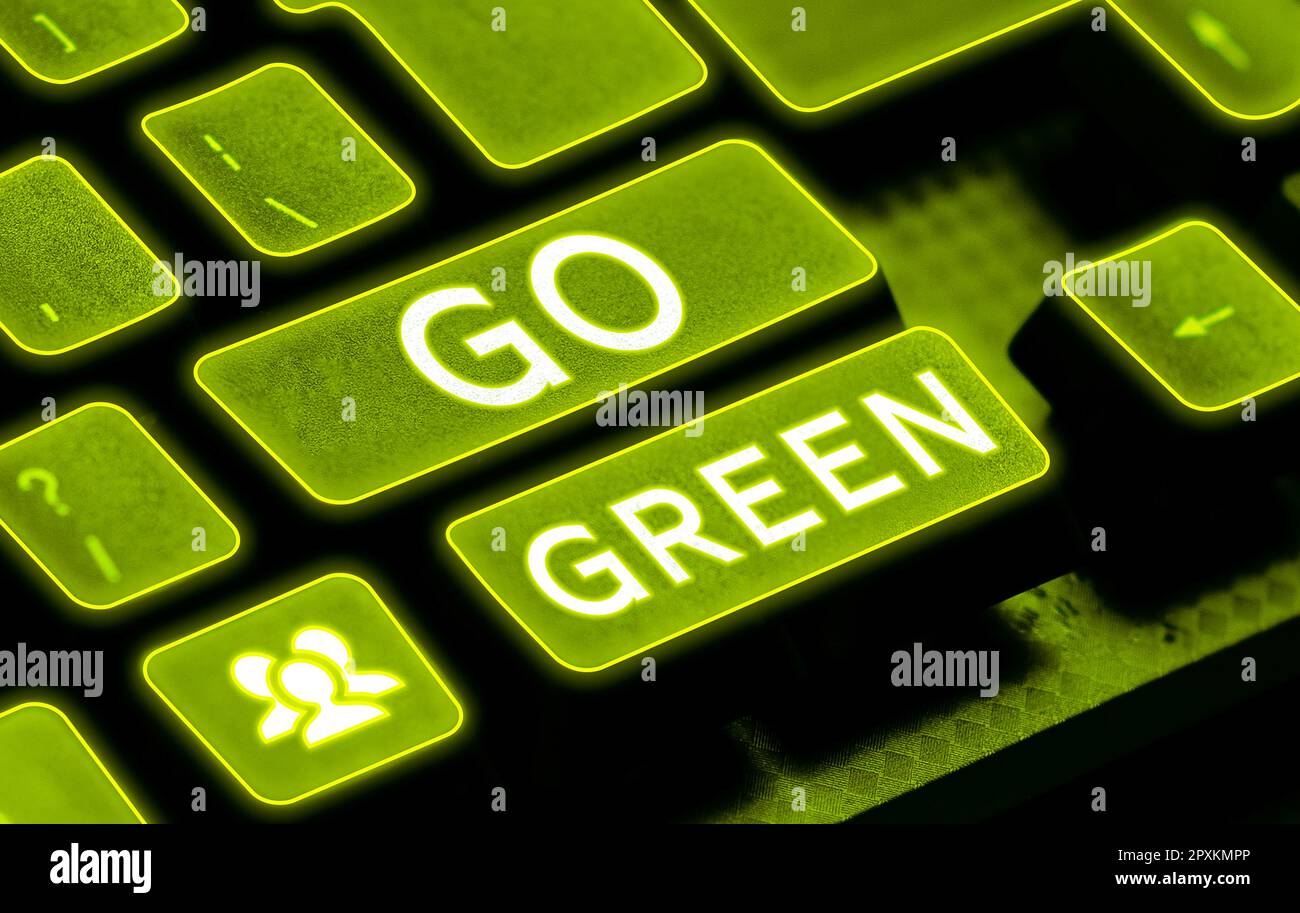 Hand writing sign Go Green, Word Written on making more environmentally ...