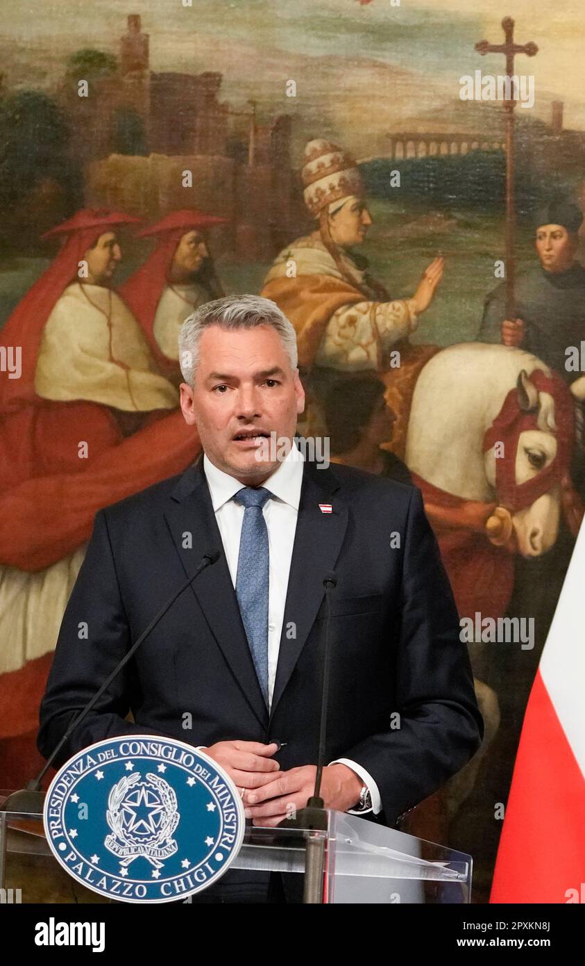 Austria's Chancellor Karl Nehammer talks during a joint press conference with Italian Premier ...